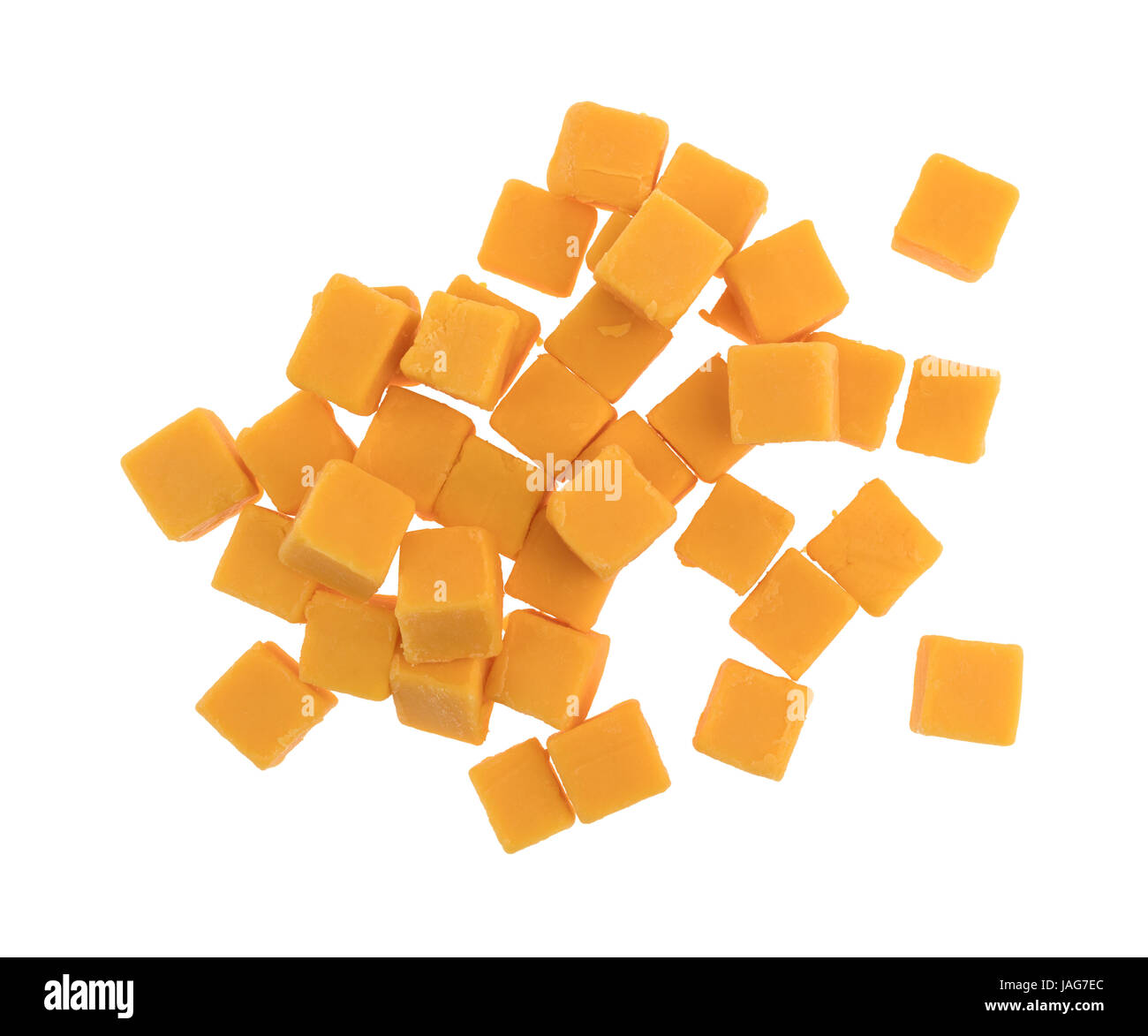 Top view of a group of cubed mild cheddar cheese pieces isolated on a ...