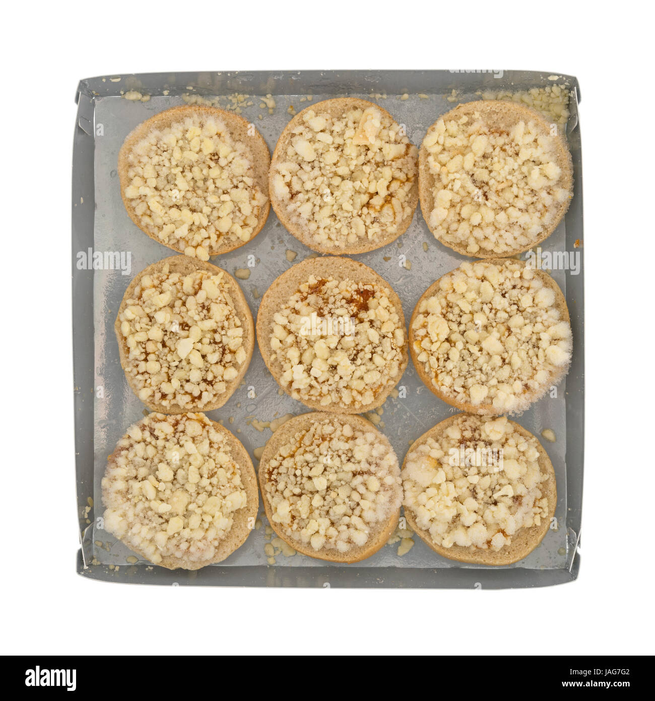 Top view of mini cheese bagels in a microwavable tray isolated on a ...
