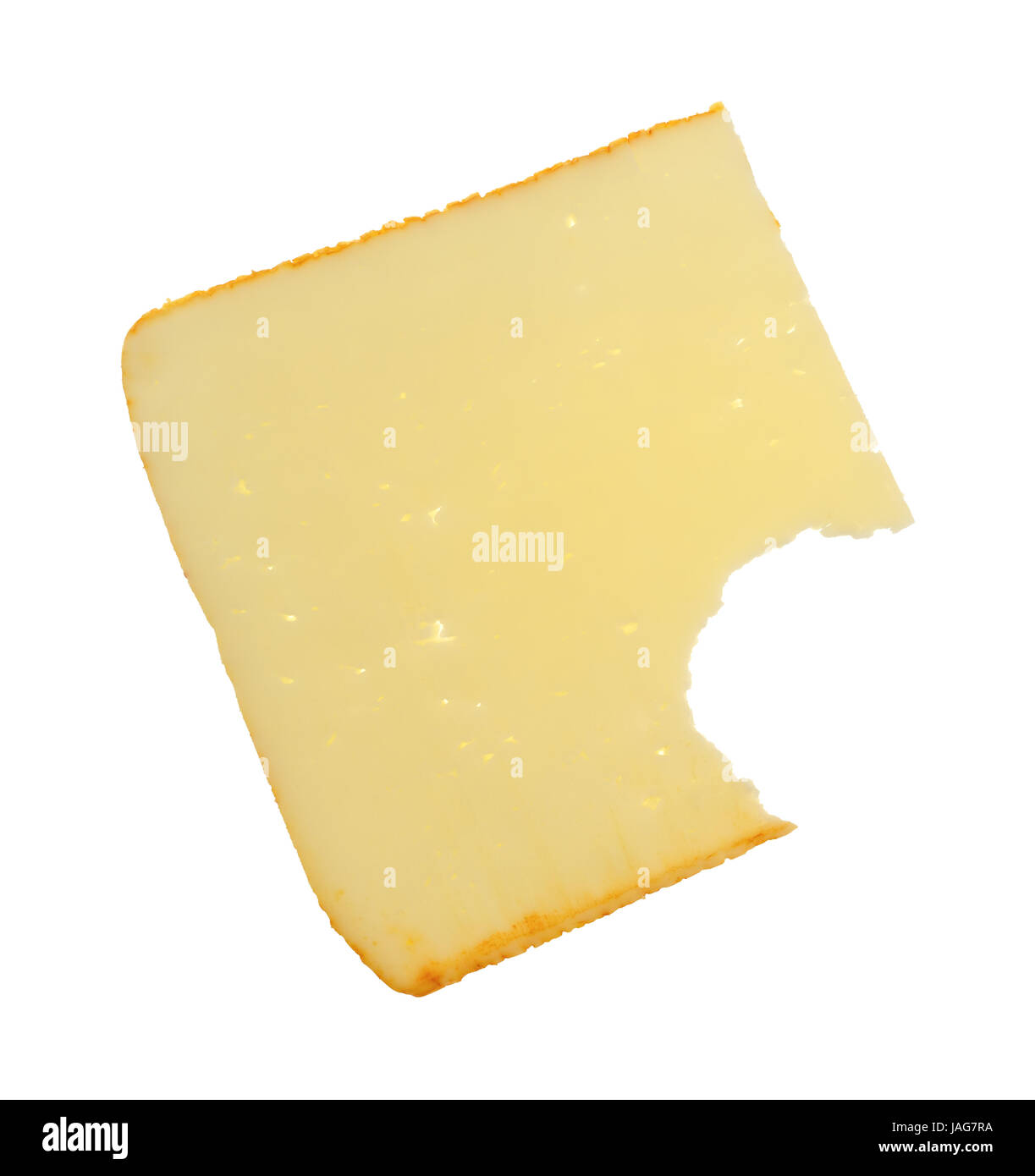 A slice of muenster cheese that has been bitten isolated on a white ...
