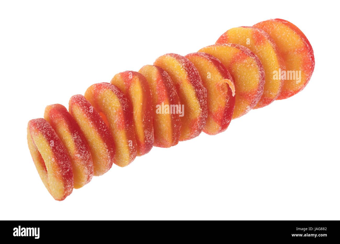 A row of peach flavored candy rings isolated on a white background ...