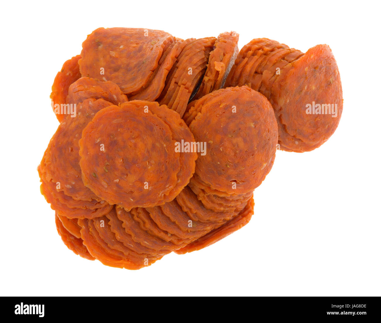 Top view of a small pile of pepperoni slices isolated on a white ...