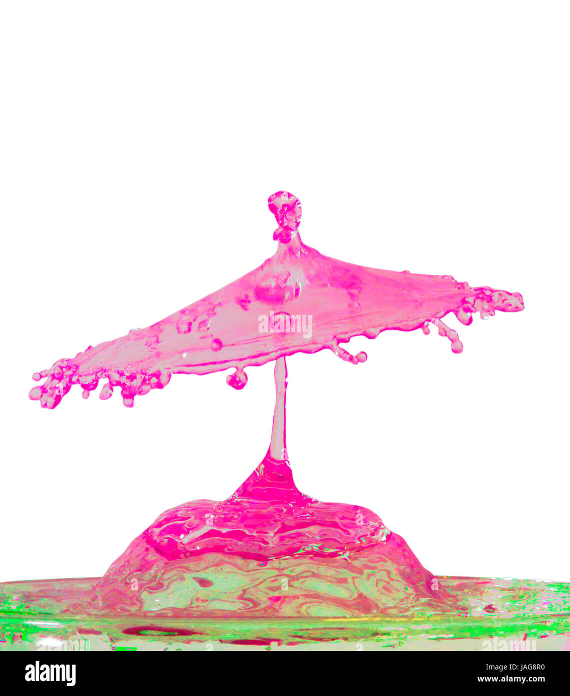 Colorful liquid splash isolated on white background closeup Stock Photo ...