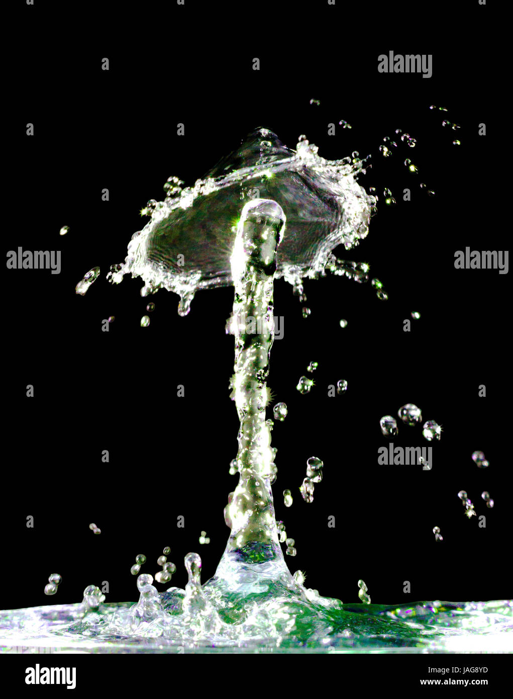 Colorful liquid splash isolated on black background closeup Stock Photo ...