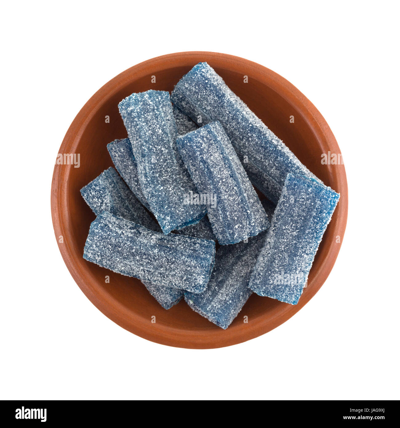 Top view of blue gummy sweet and sour sugar candy in a bowl isolated on ...