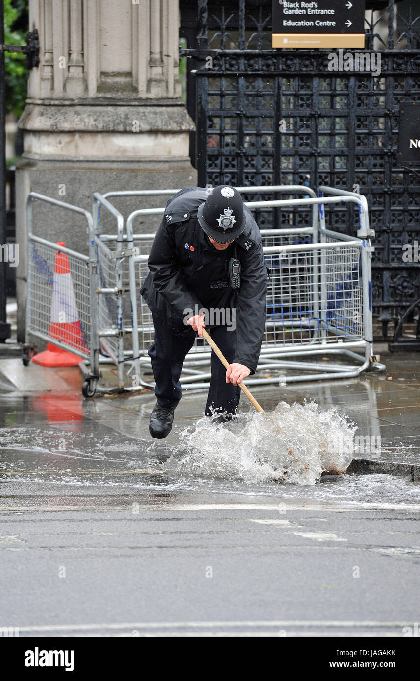 A police officer guarding the Palace of Westminster, central London ...