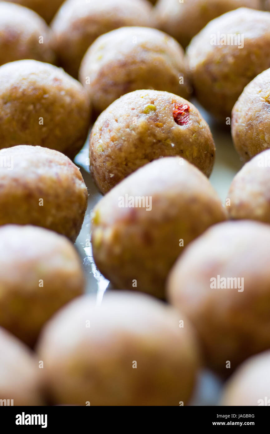 Raw Uncooked Meatballs on a Plate Before Cooking Stock Photo - Alamy