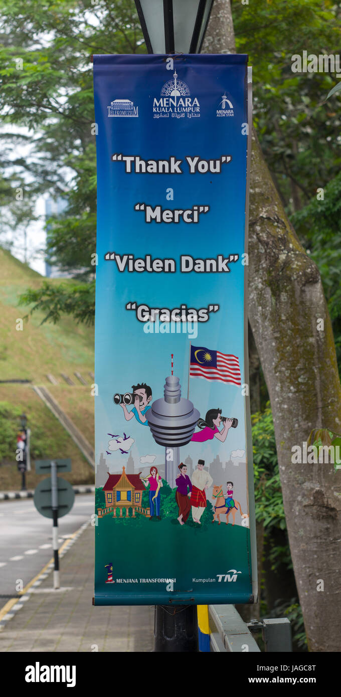Banner with multilingual thanks for visitors to Menara KL Tower, Kuala ...