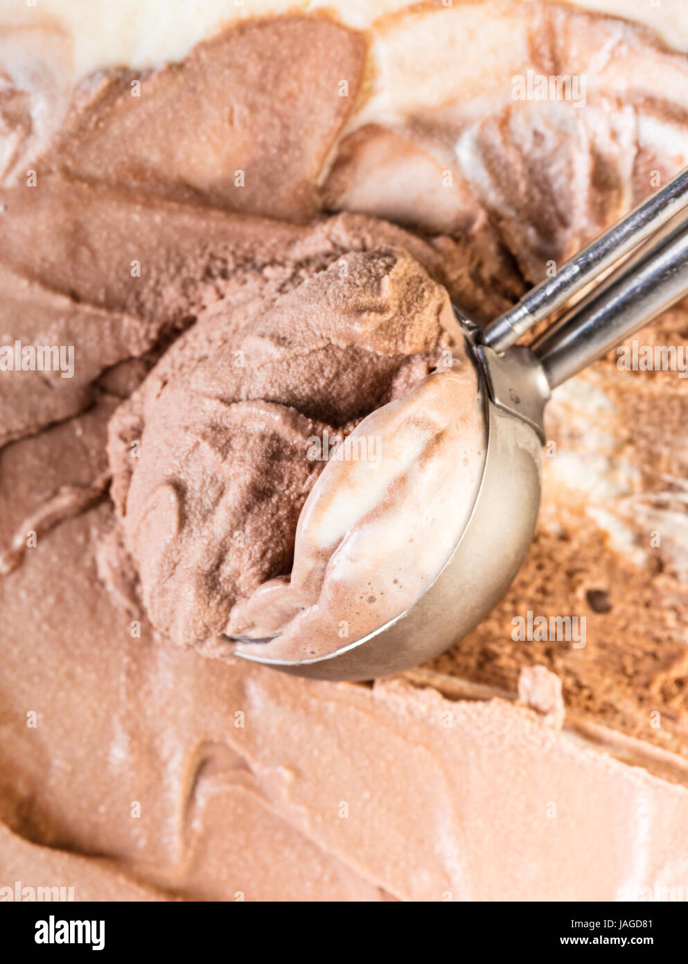 Spoon chocolate with vanilla ice cream closeup Stock Photo - Alamy