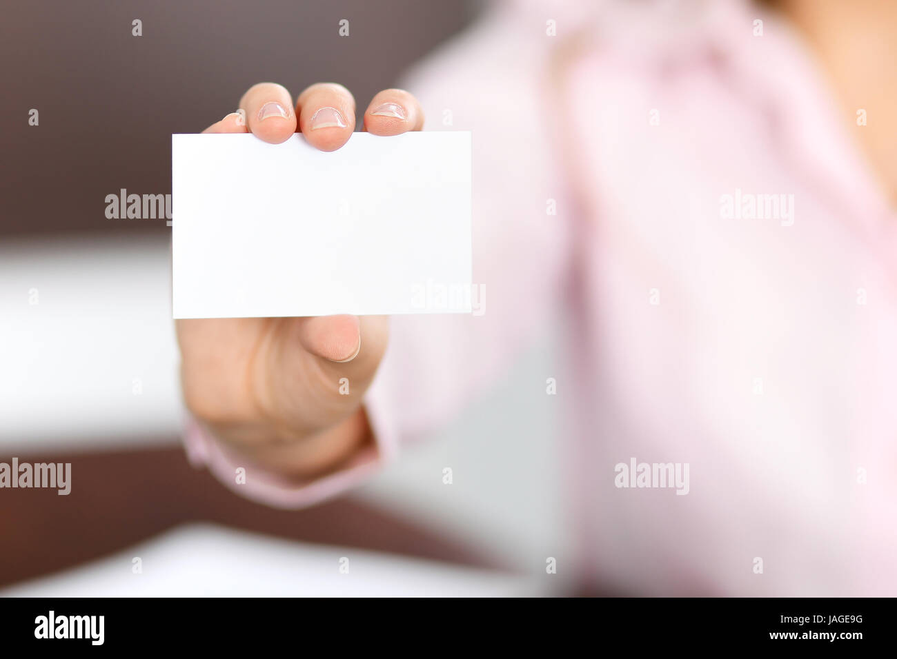 Business woman giving visit card Stock Photo - Alamy