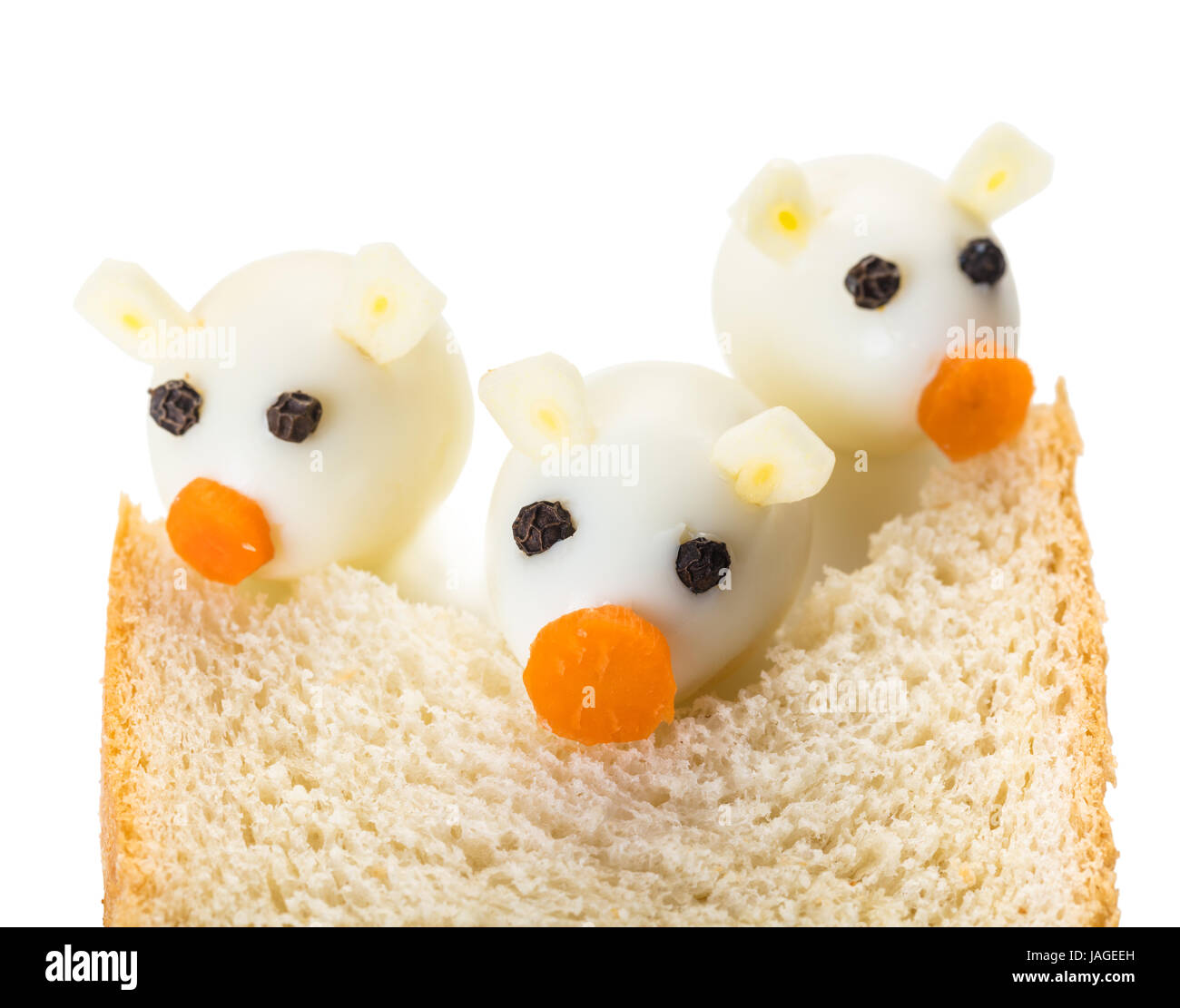 Three Little Pigs from quail eggs and a slice of bread Stock Photo - Alamy