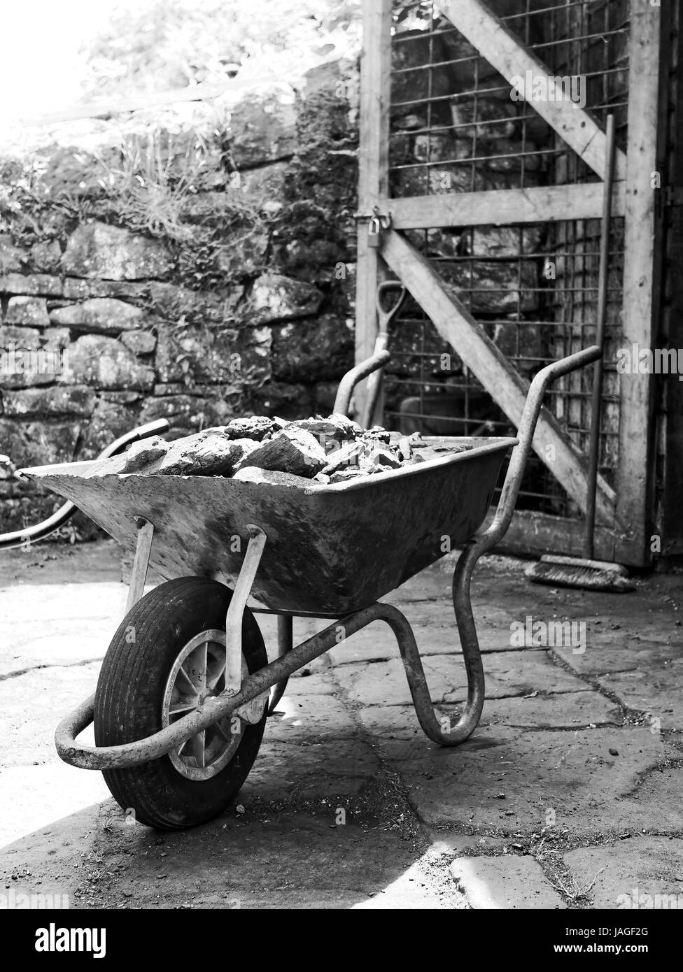 Full wheel barrow Black and White Stock Photos & Images - Alamy