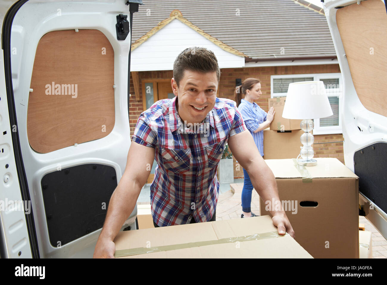 Unloading van with boxes hi-res stock photography and images - Alamy
