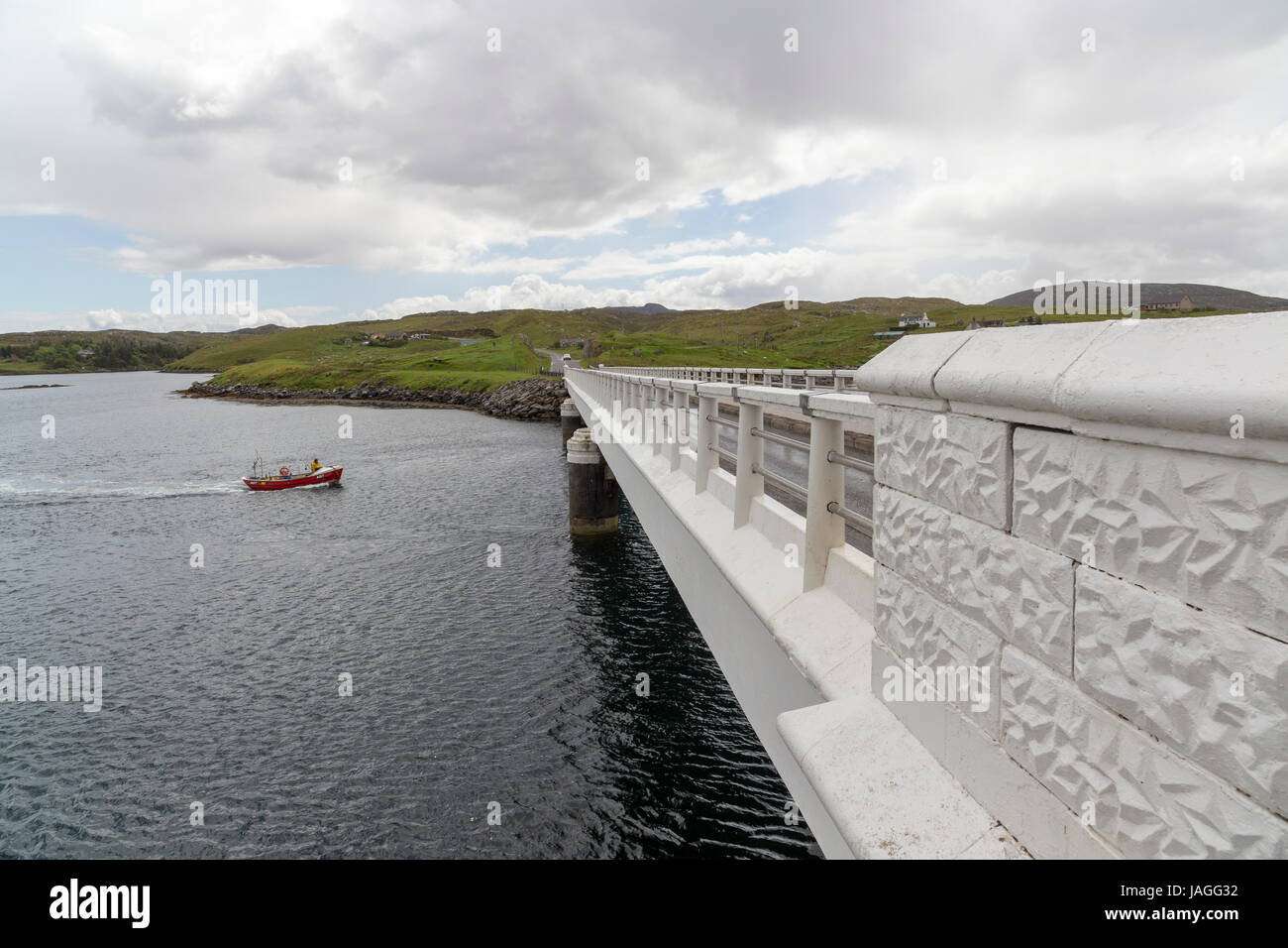 Fishing vessel passing under the Great Bernera Bridge, Isle of Lewis ...