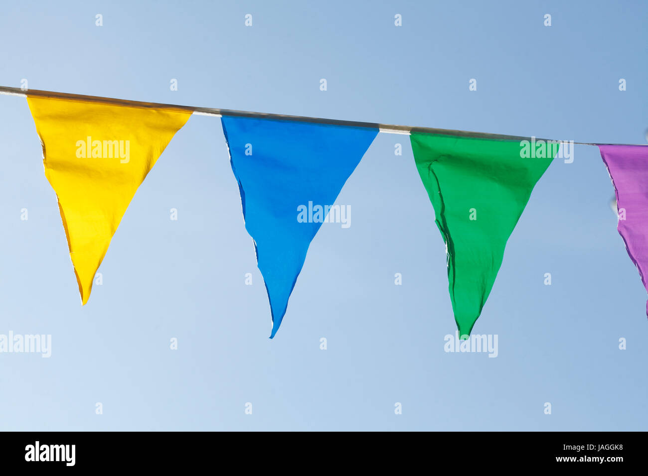 colorful pennon chain on a string Stock Photo - Alamy