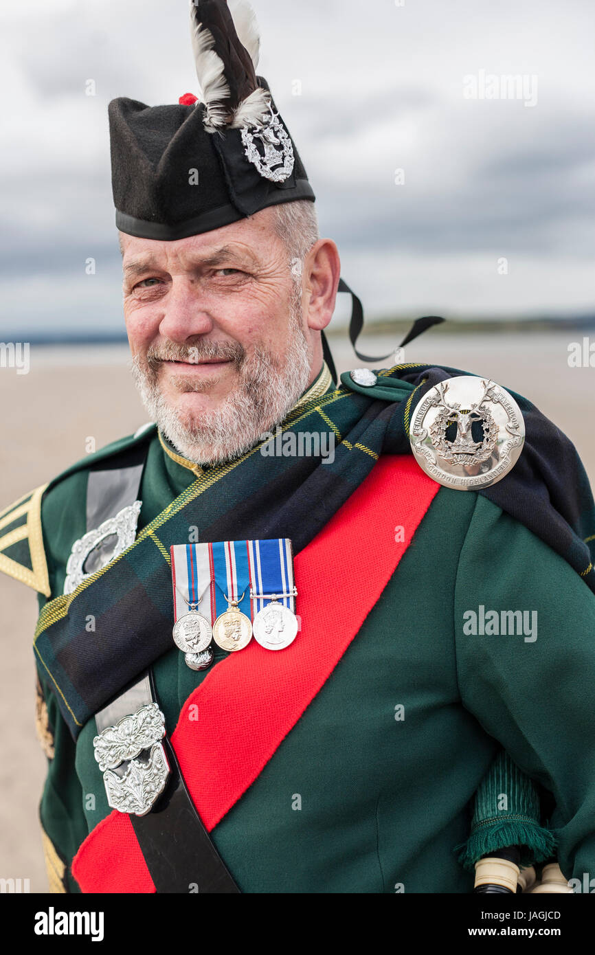 John Mackintosh is a traditional Scottish Bagpiper. He had a career as ...