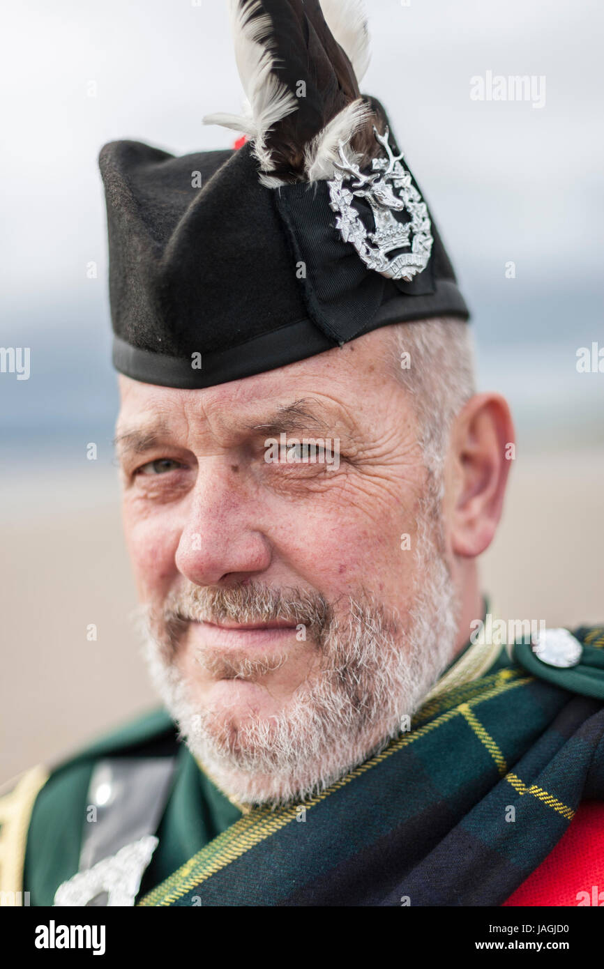 John Mackintosh is a traditional Scottish Bagpiper. He had a career as ...