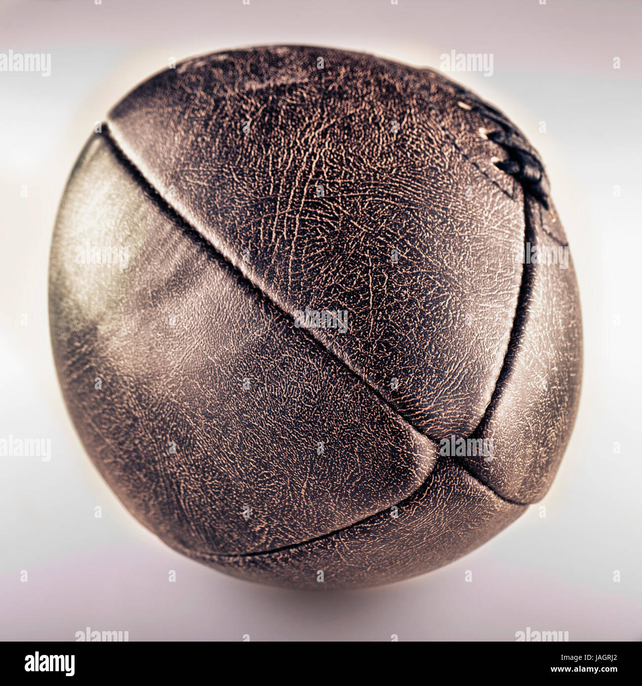 Old football in closeup over a dirty white background Stock Photo - Alamy