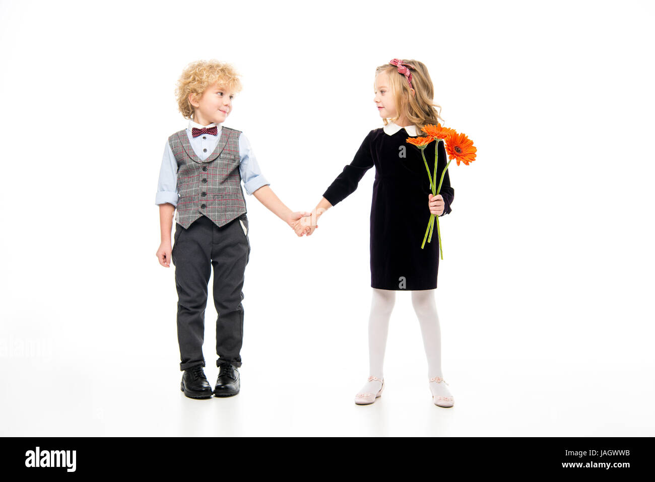 Beautiful children with flowers Stock Photo - Alamy
