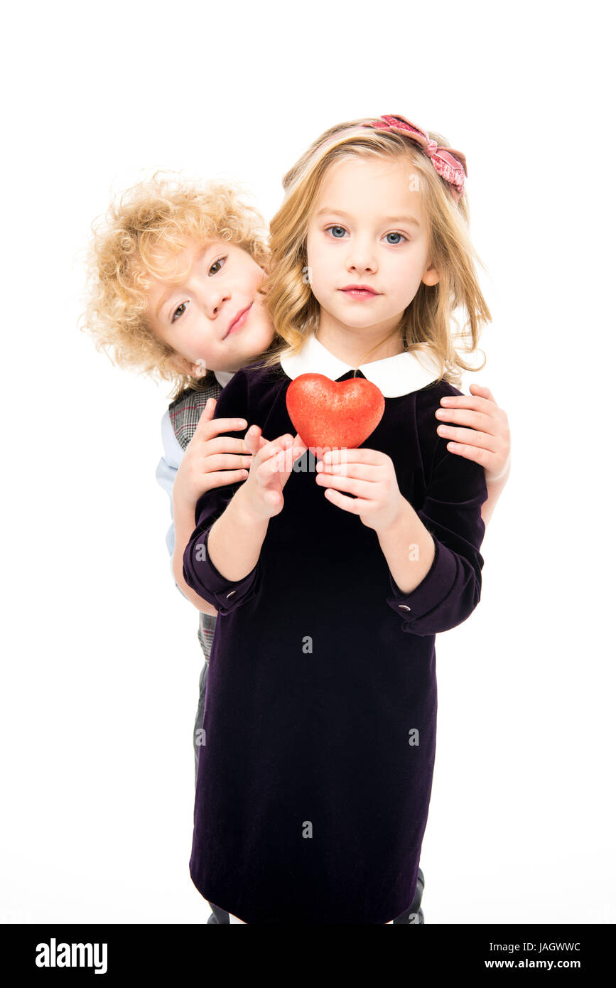 Kids with red heart sign Stock Photo - Alamy