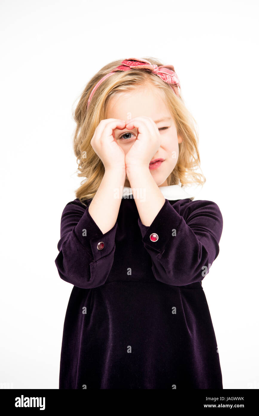 Girl gesturing heart sign Stock Photo - Alamy