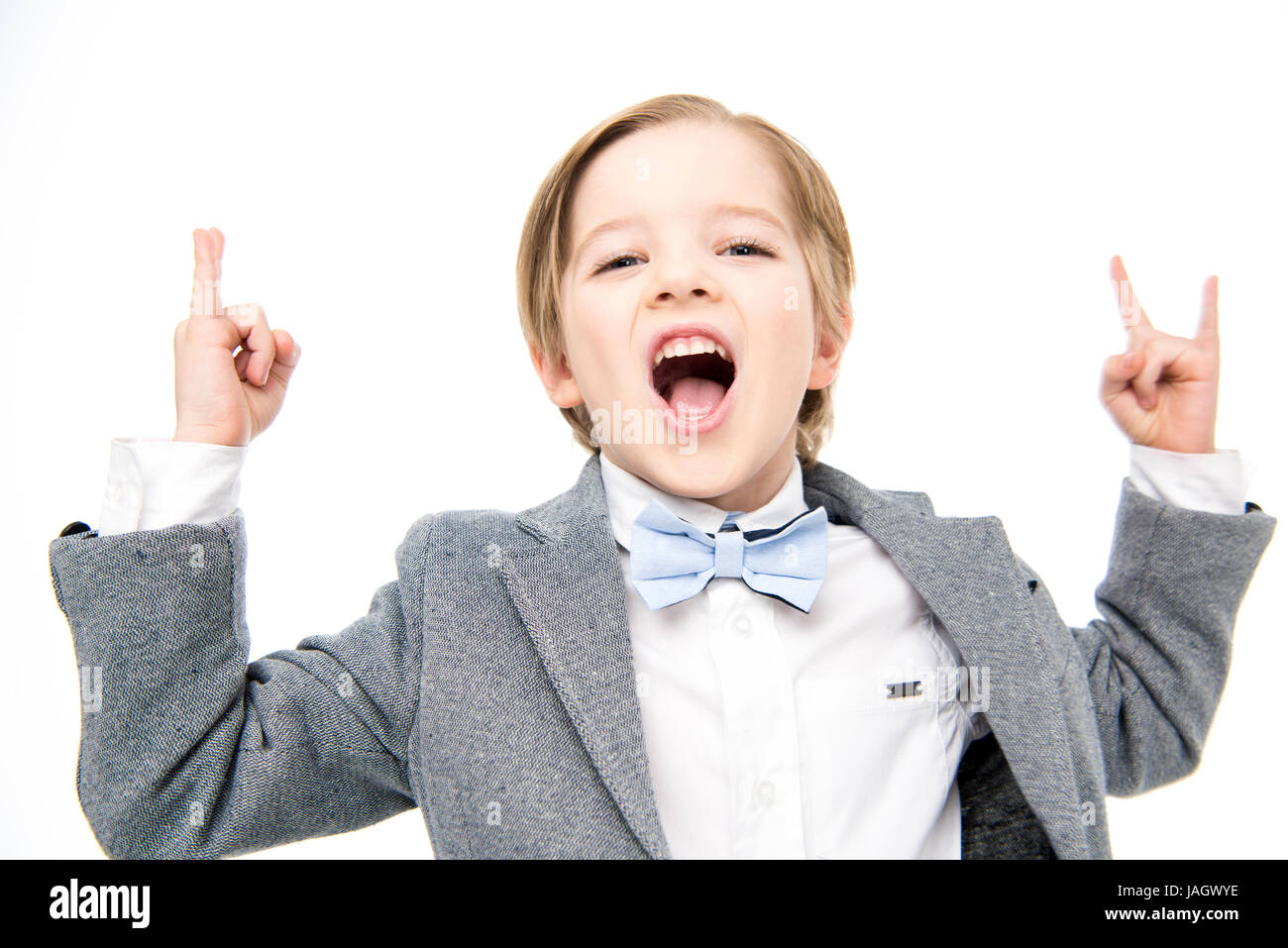 Boy showing rock sigh Stock Photo - Alamy
