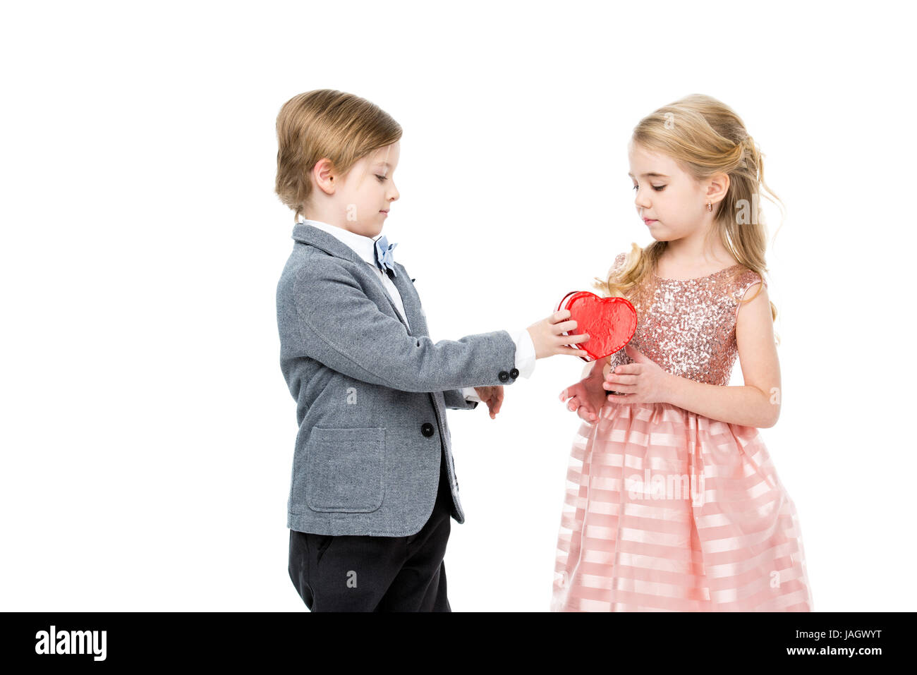Boy gives present to girl Stock Photo - Alamy