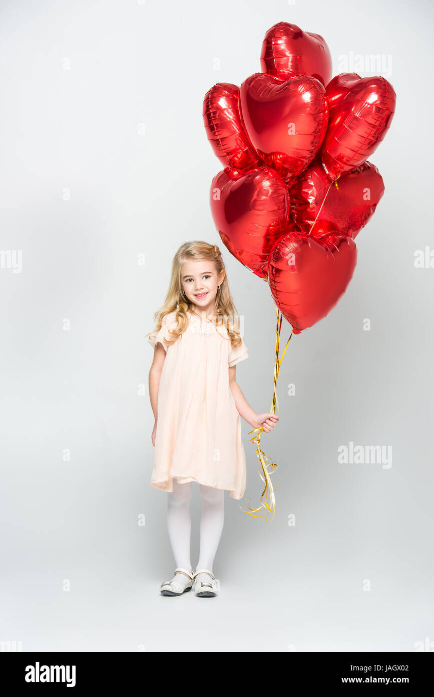 Girl with air balloons Stock Photo - Alamy