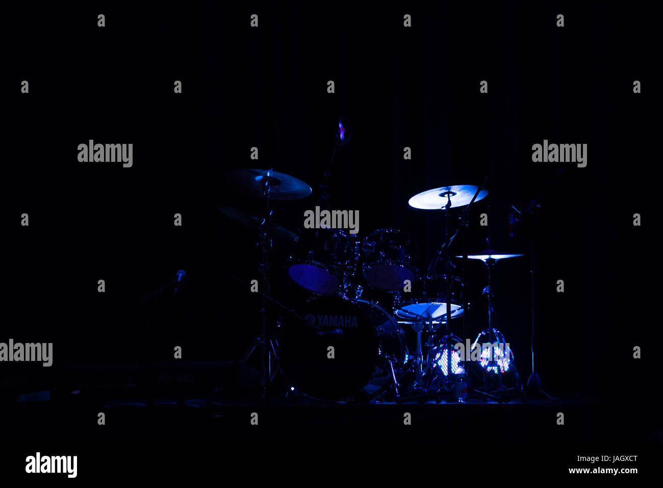Drum Kit - blue light Stock Photo - Alamy