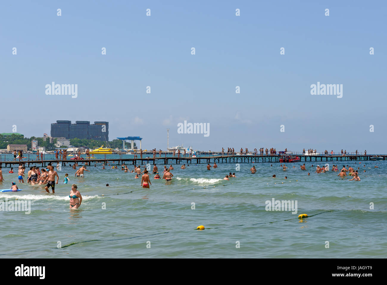 View from shallow of Central municipal sand beach towards long pier ...