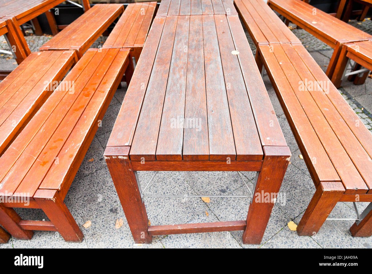 empty wooden table in outdoor restaurant Stock Photo - Alamy