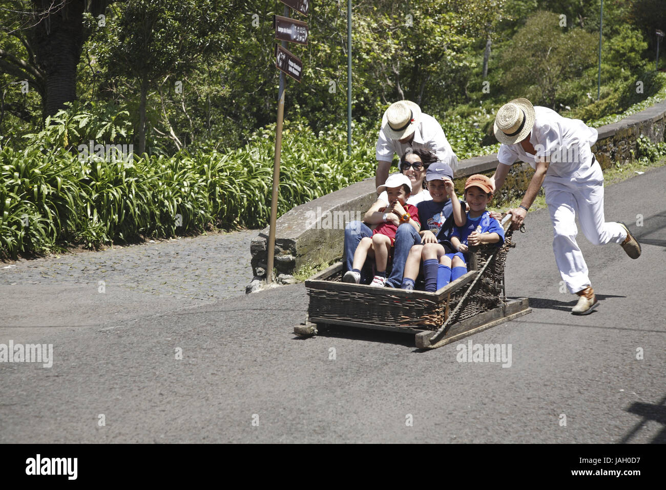 Portugal,Madeira,tourist,wicker slide journey Stock Photo - Alamy