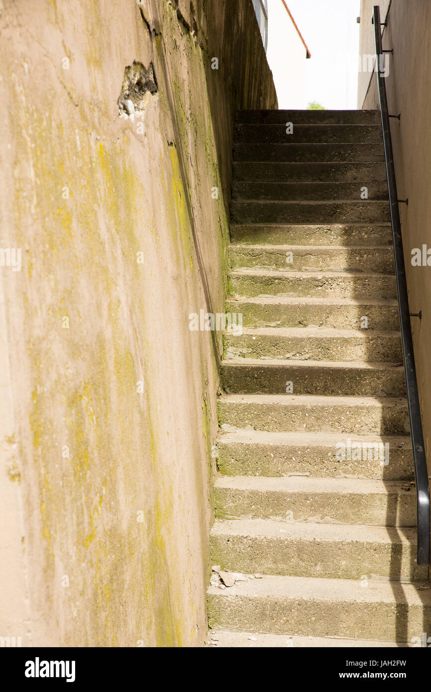 Old concrete stairs between two walls Stock Photo - Alamy