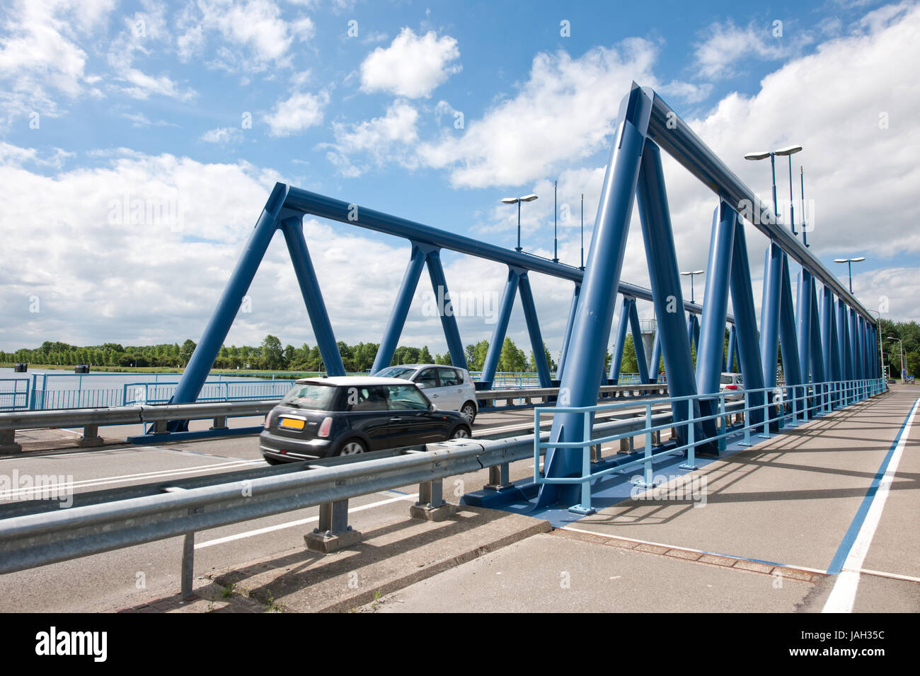 Cars ride over bridge on hi-res stock photography and images - Alamy