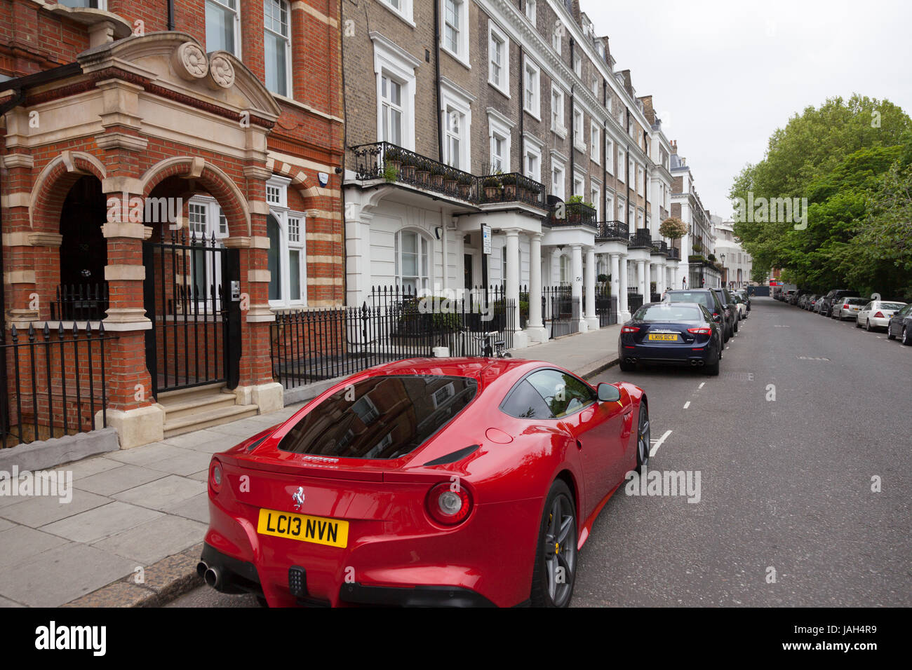 Ferrari on the street hi-res stock photography and images - Alamy