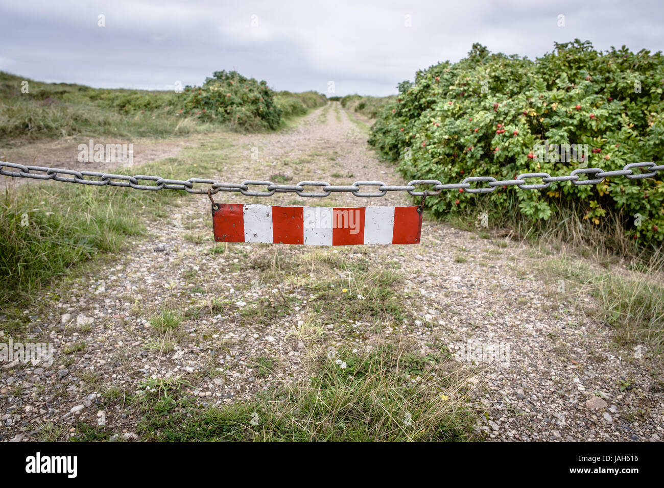 Stop sign hanging on chain hi-res stock photography and images - Alamy