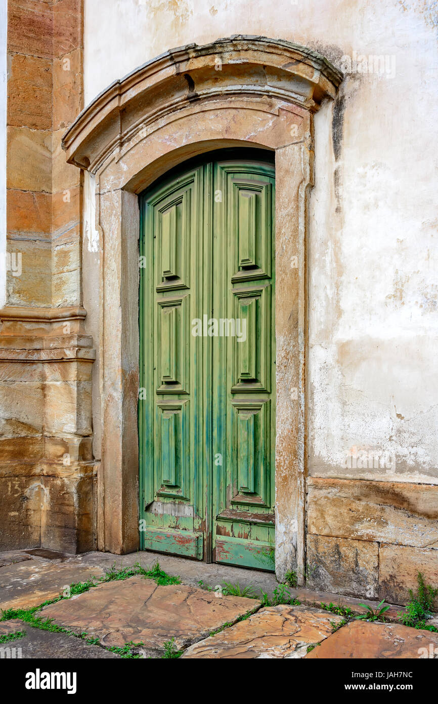 Old wooden church door in the ancient city of Ouro Preto Stock Photo ...
