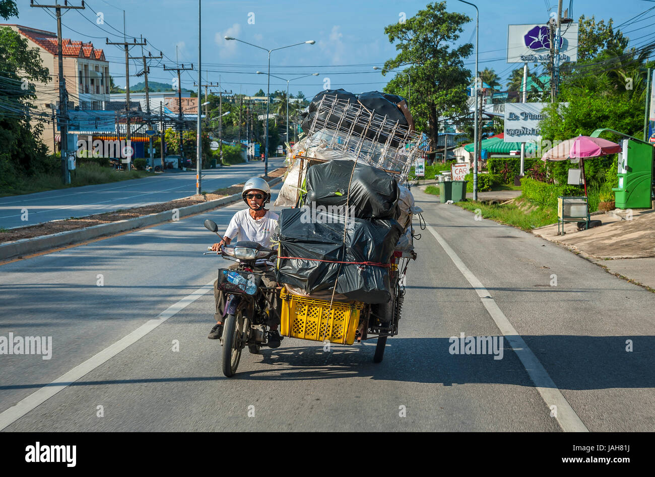 Motorcycle with heavily loaded side car, Phuket, Thailand Stock Photo ...