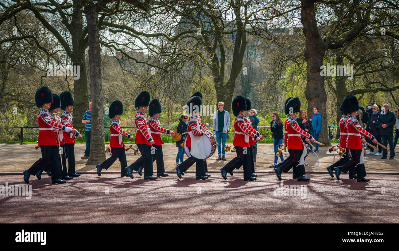 Guardsmen of the Queen's Guard, Royal Guards in red uniform on the way ...
