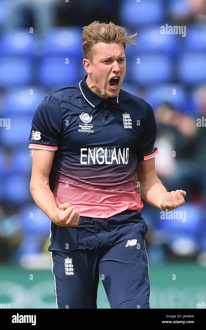 England's Jake Ball celebrates taking the wicket of New Zealand's Luke ...