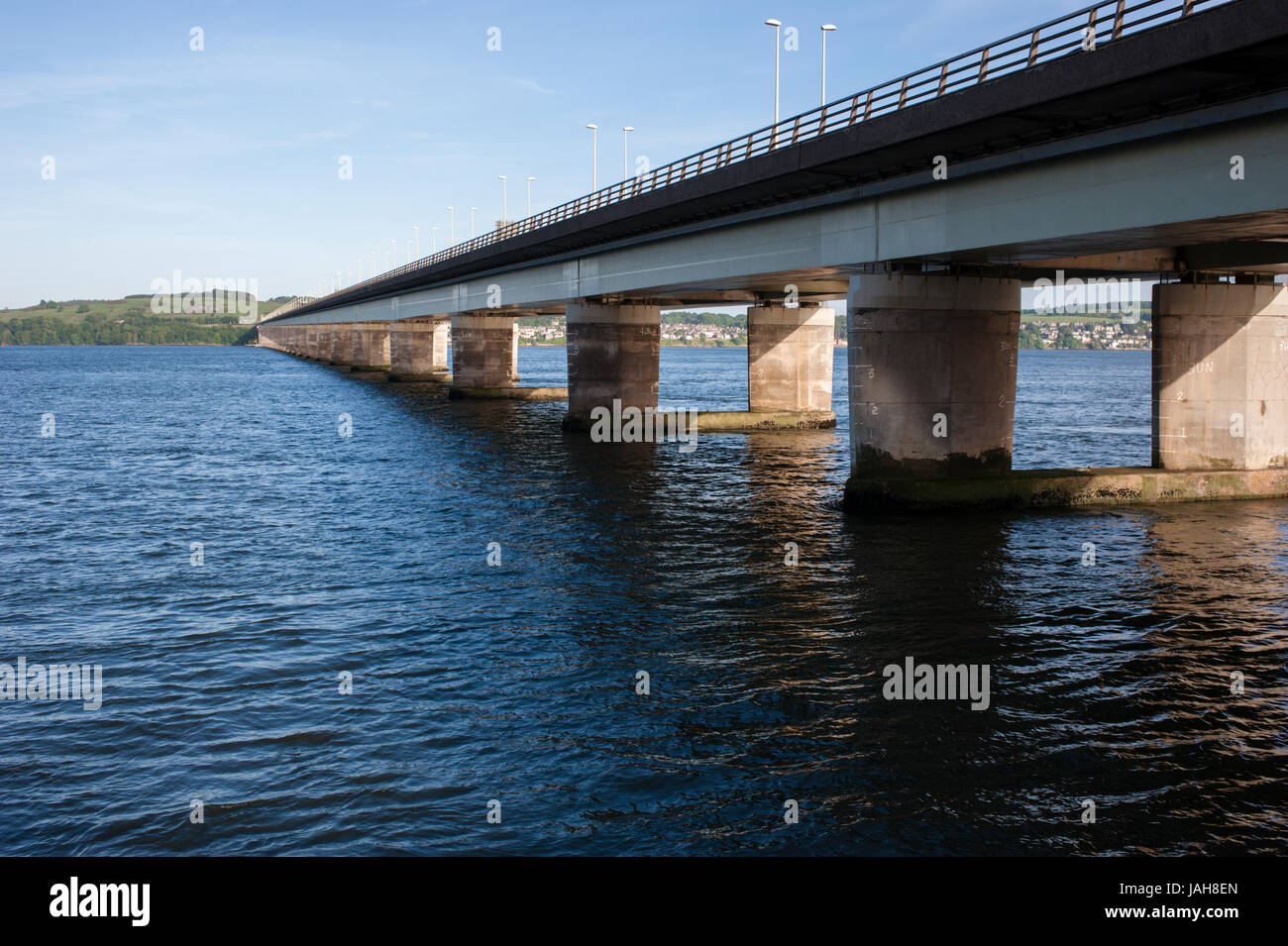 The Tay Road Bridge as seen from the north bank of the estuary of the ...