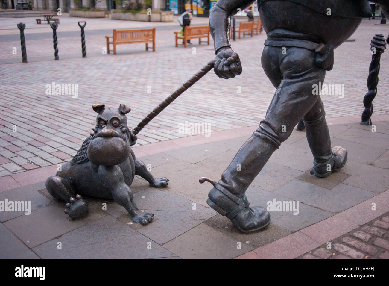 The statue of Desperate Dan in Dundee City Centre alongside a statue of ...