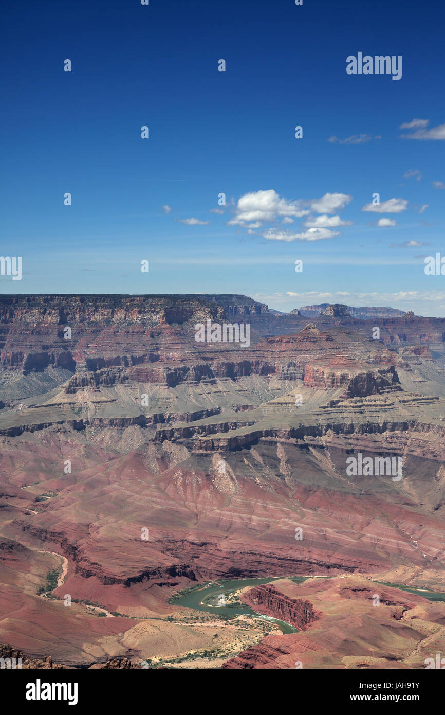 distant views of the colorado river flowing through the grand canyon in ...