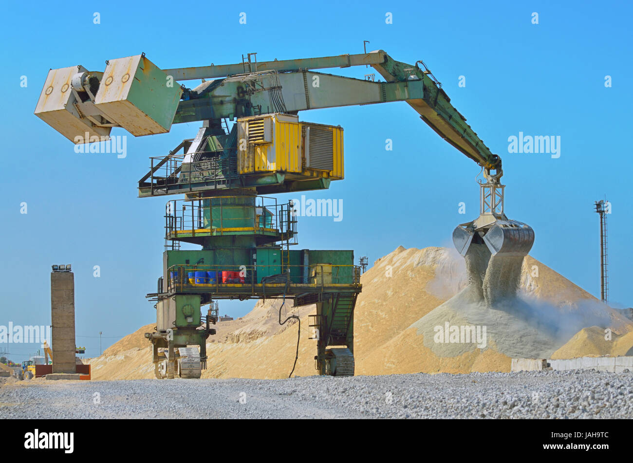 Heavy excavator loader at soil moving works at construction Stock Photo ...