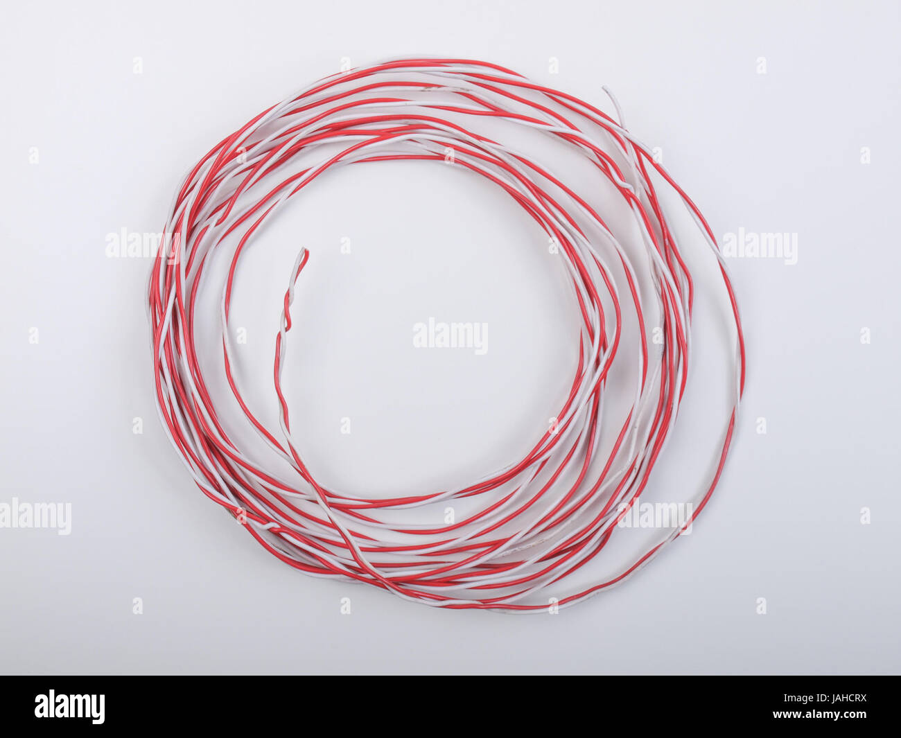 Detail of red and white telephony cable Stock Photo - Alamy