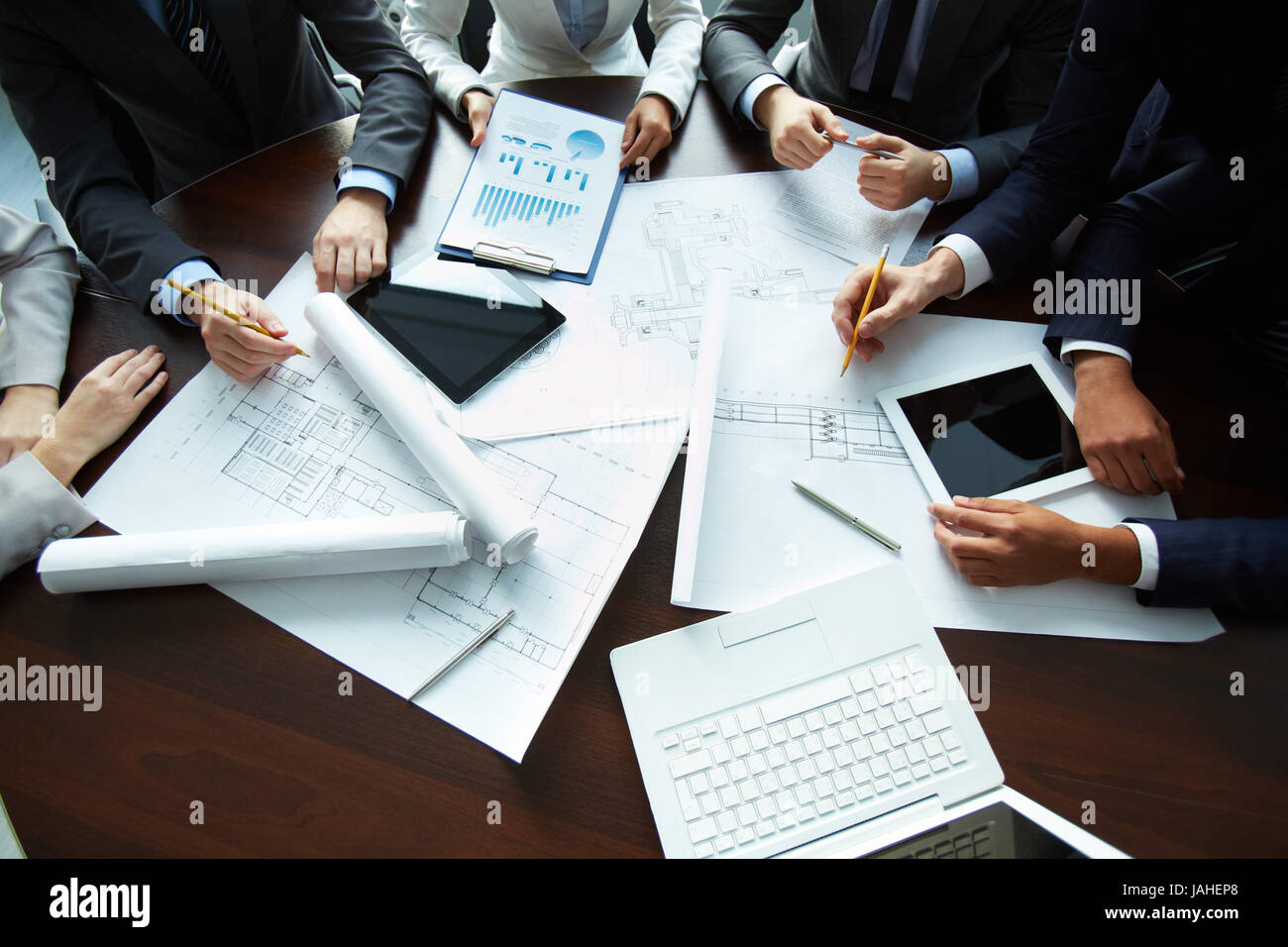 Image of human hands during paperwork at meeting Stock Photo - Alamy