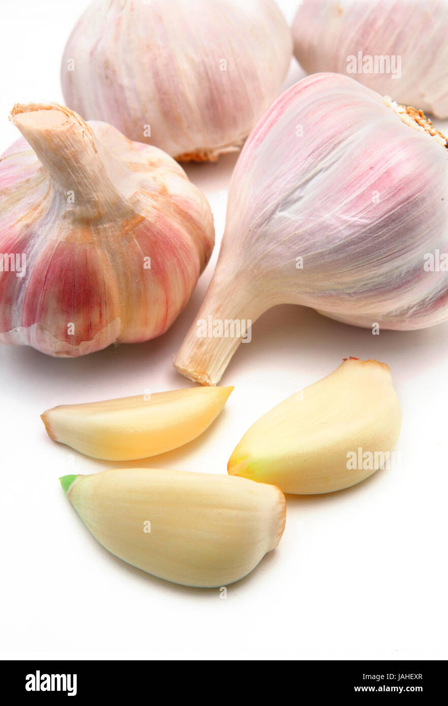 garlic cloves and buds isolated in white Stock Photo - Alamy