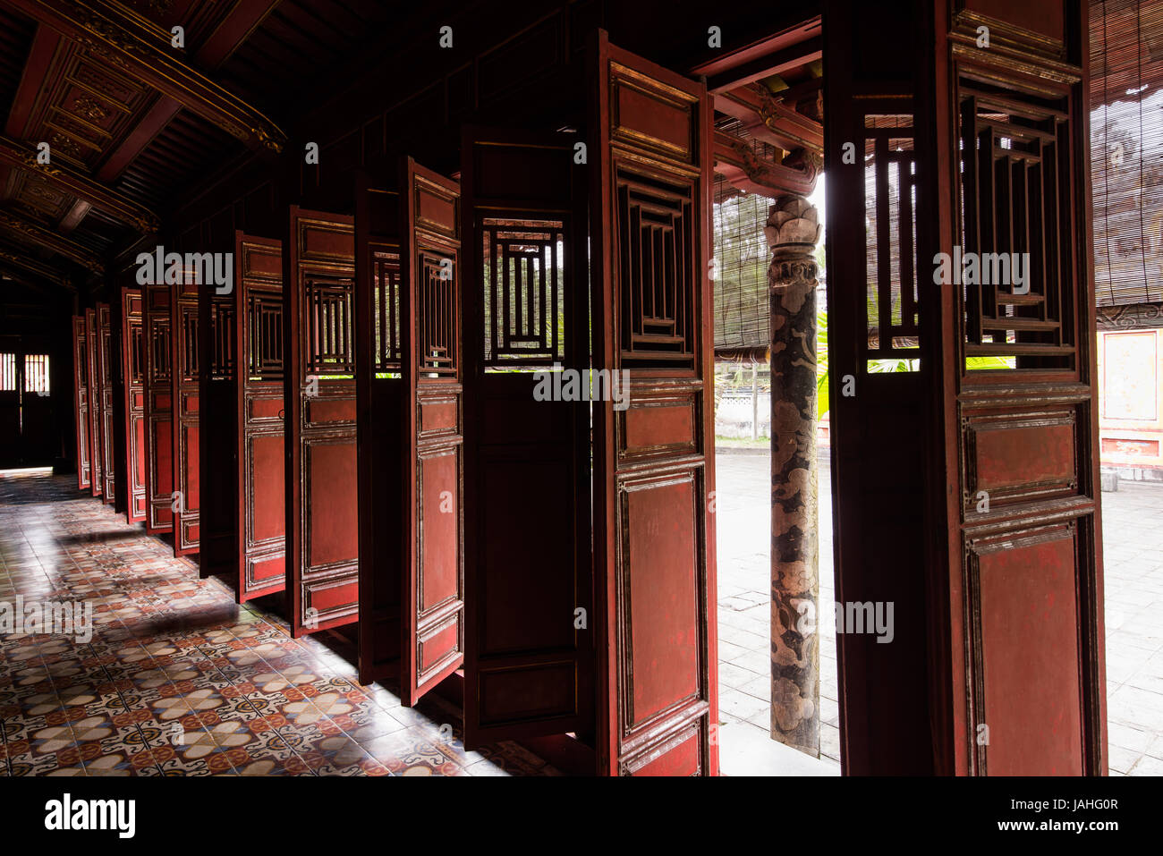 Old chinese asian wooden doors at temple Stock Photo - Alamy