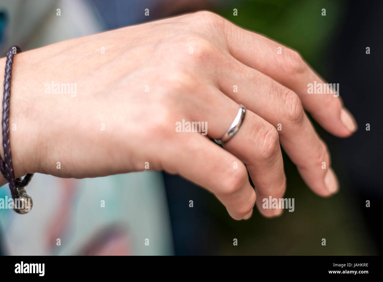 Bride hand with wedding ring closeup with detail Stock Photo - Alamy