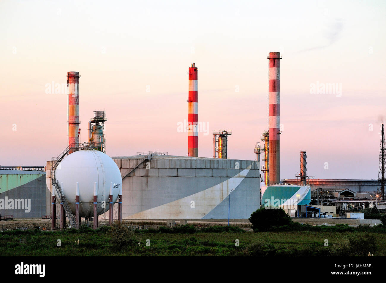 French oil refinery in Fos on sea beside Marseille. Tanks of storage ...