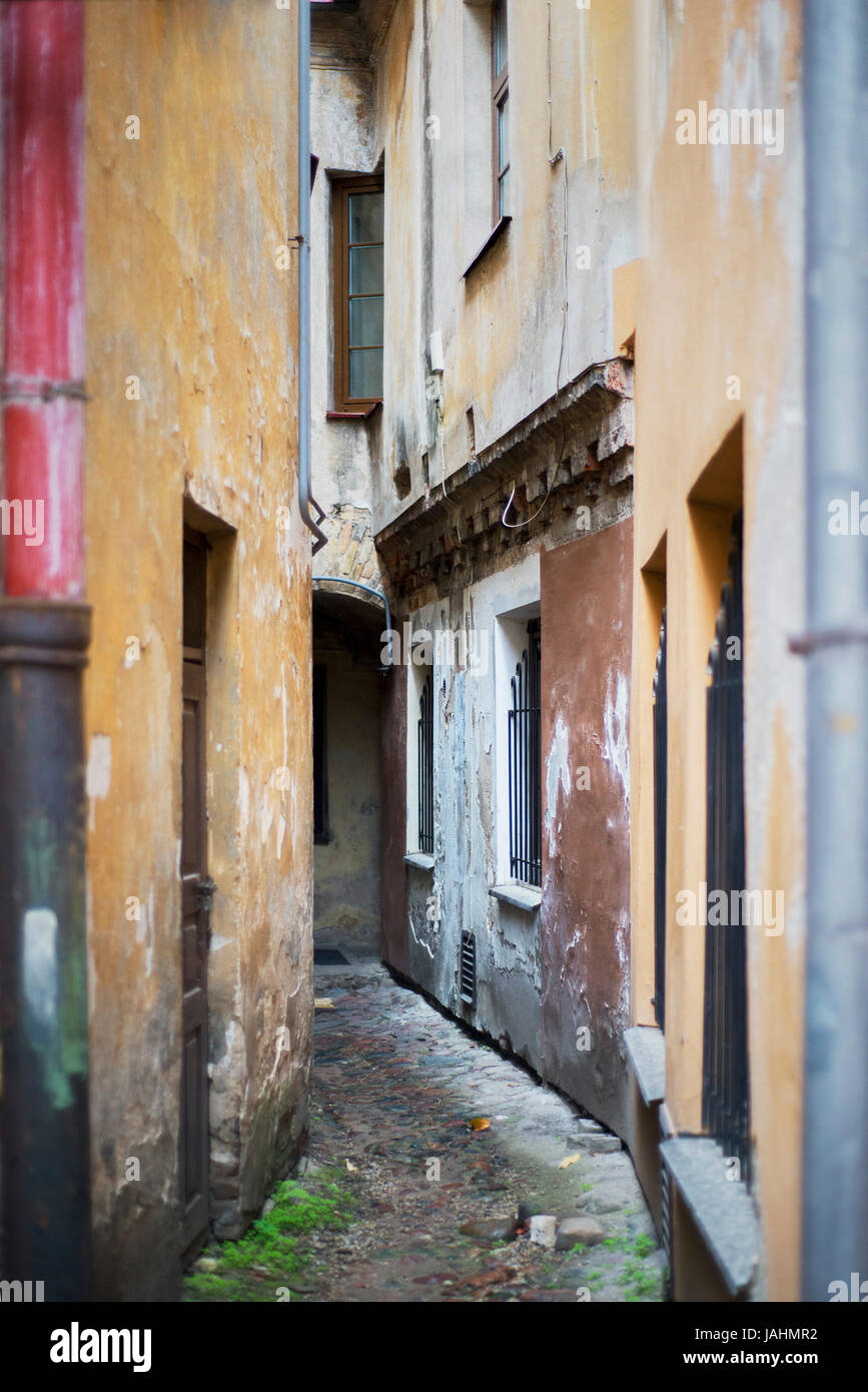 very narrow and dirty alley in the old town. The narrowest street in ...